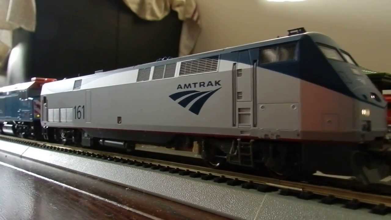 HO scale passenger train departing station - YouTube