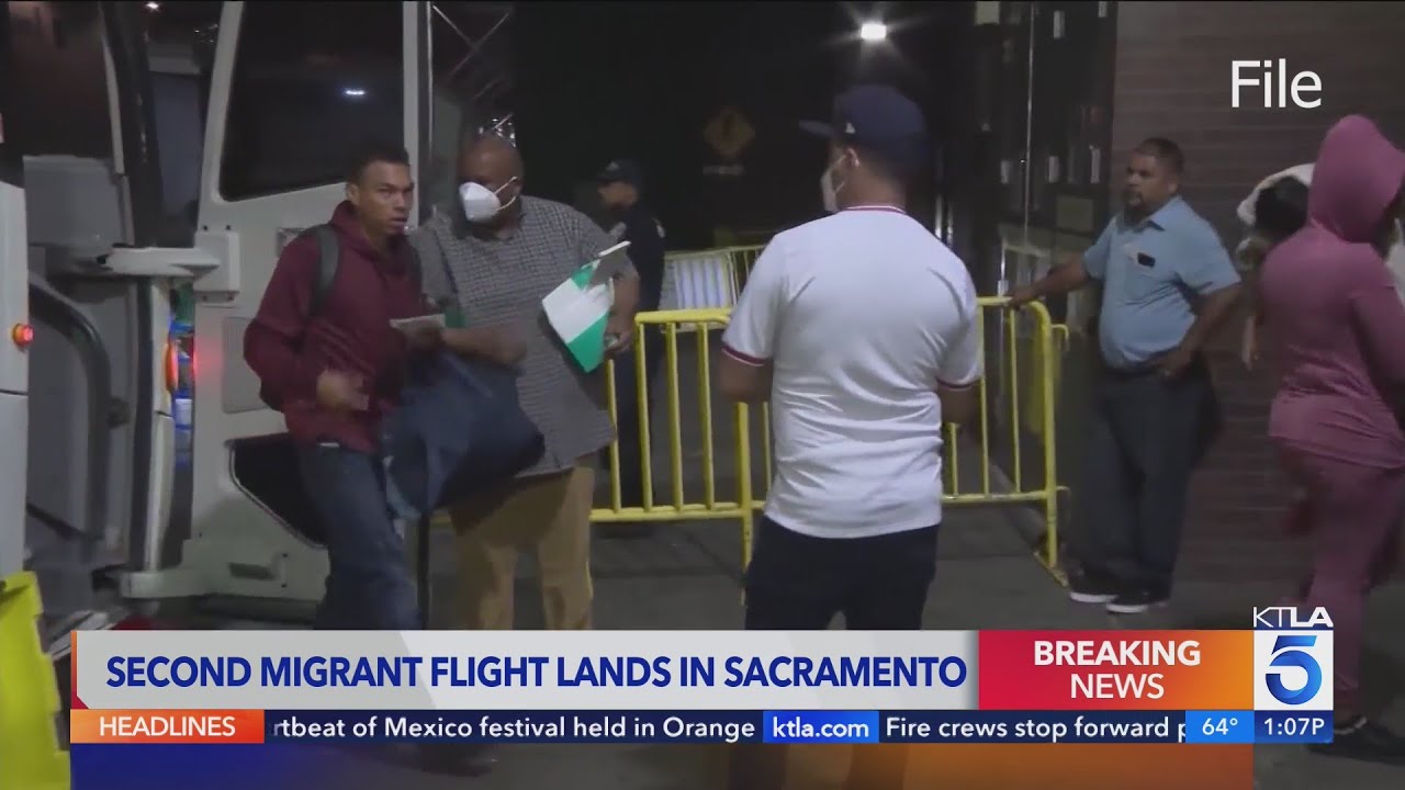 2nd migrant flight lands in Sacramento - YouTube