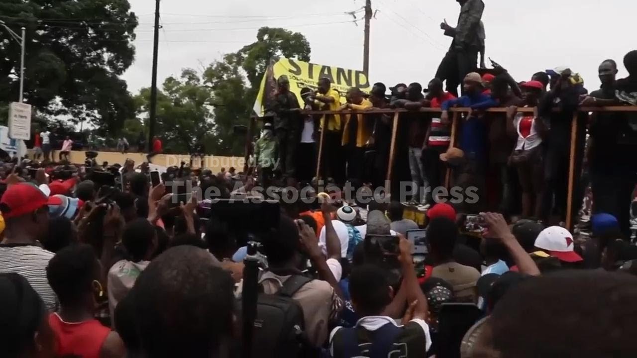 Hundreds join opposition protest on streets of Monrovia - YouTube