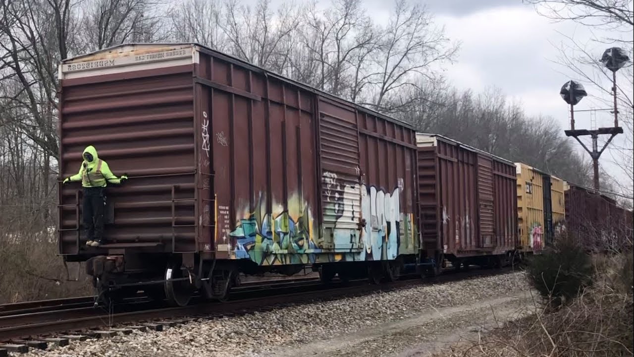 Most Dangerous Railroad Job In The World!! Conductor Riding Rear Of ...