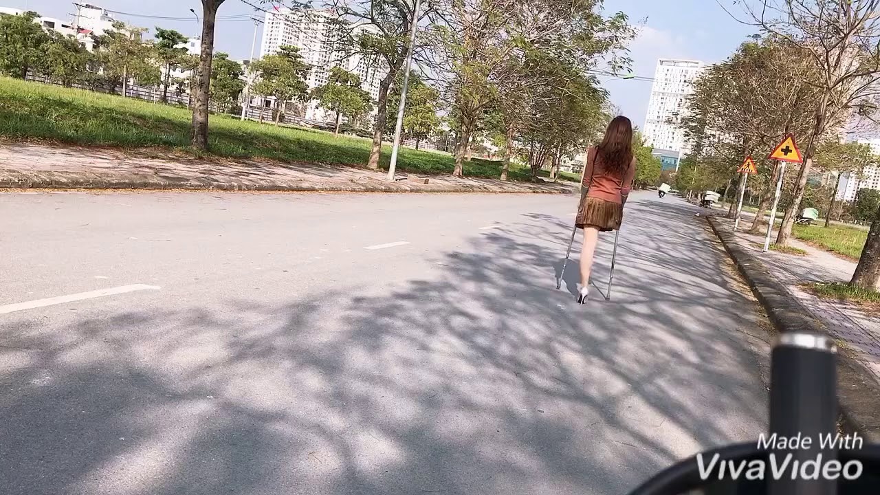 How to take elegant gait with a high heel shoe and crutches - YouTube