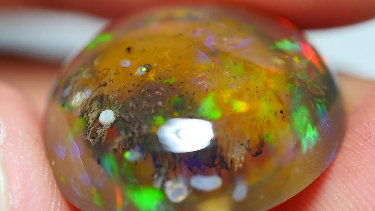 11.65 CRT (CRACK) UNIQUE ROUND ROOT FOSSIL INSIDE MULTICOLOR WELO OPAL ...
