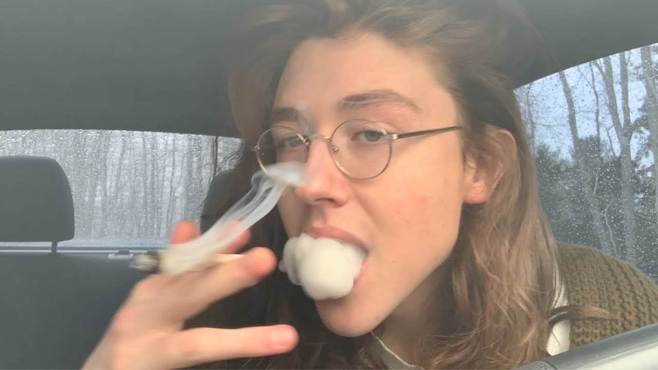 rolling & smoking a FAT joint - YouTube