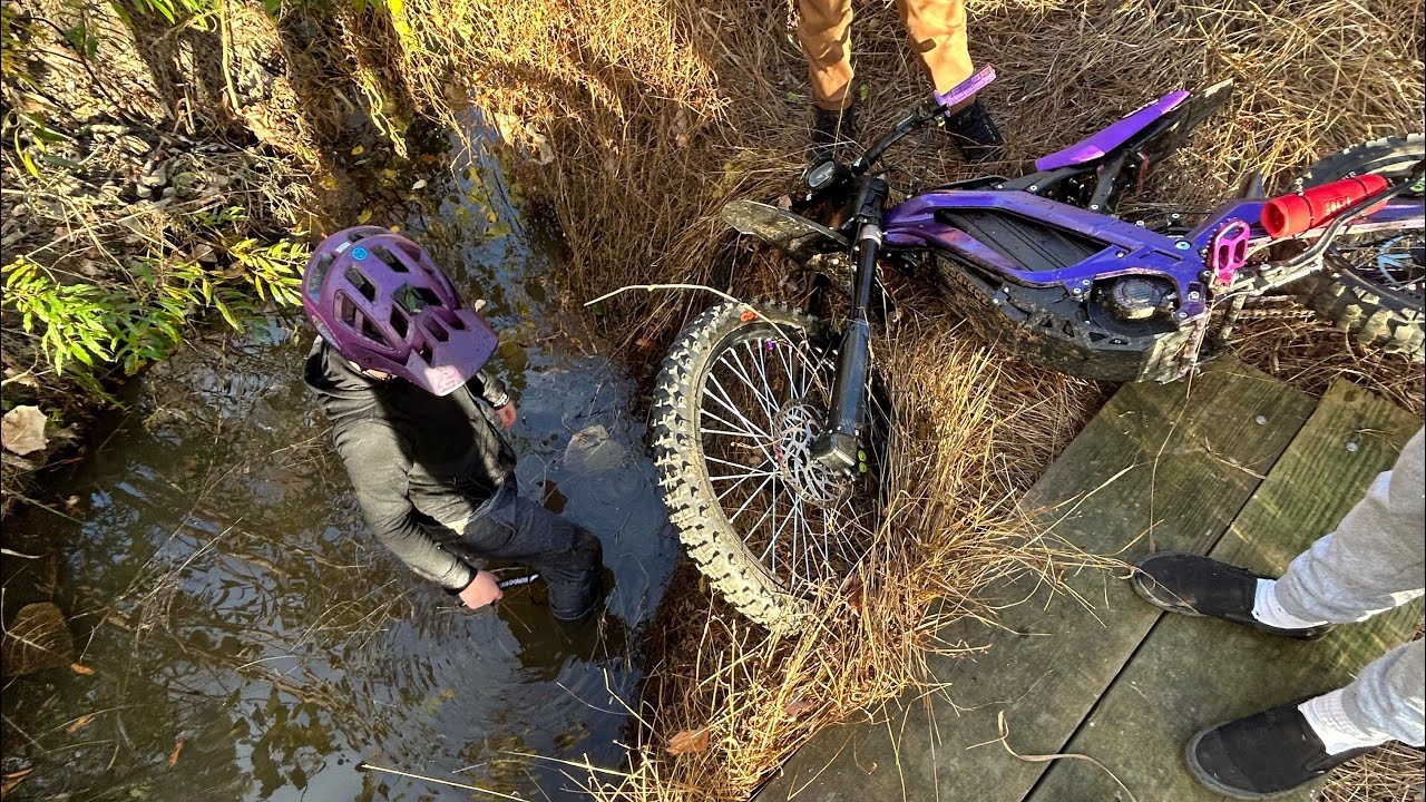 Brand new Surron crashes into creek - YouTube