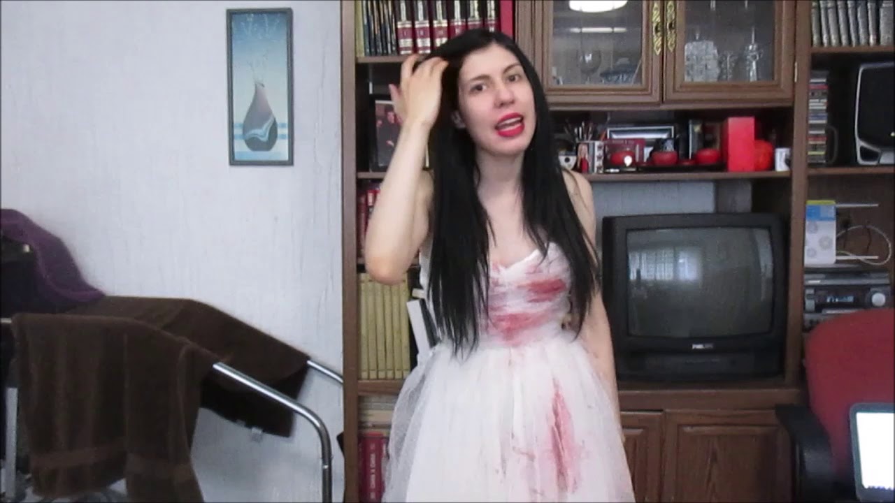 Like a combination of Jason Voorhees and Samara Morgan (and singing ...