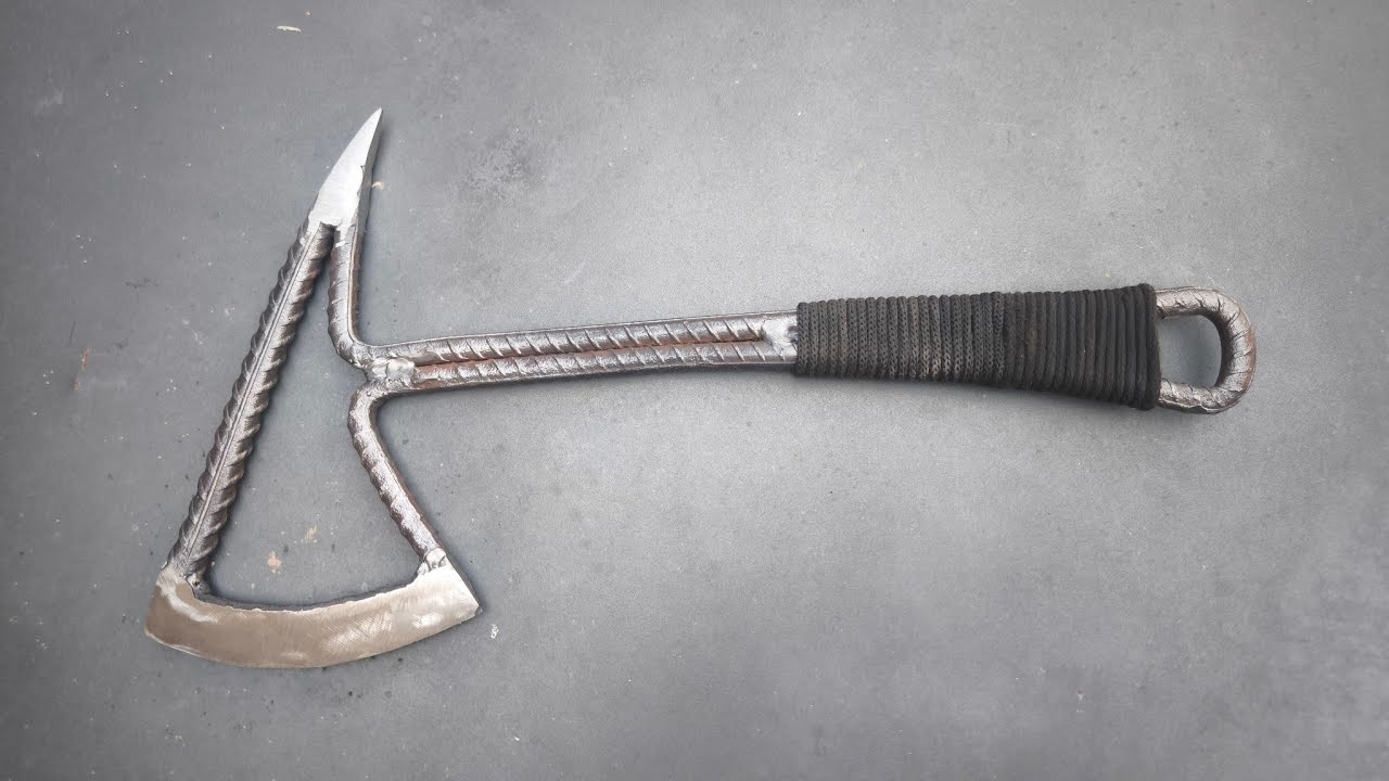 Learning how to make an ax from ribbed rebar - YouTube