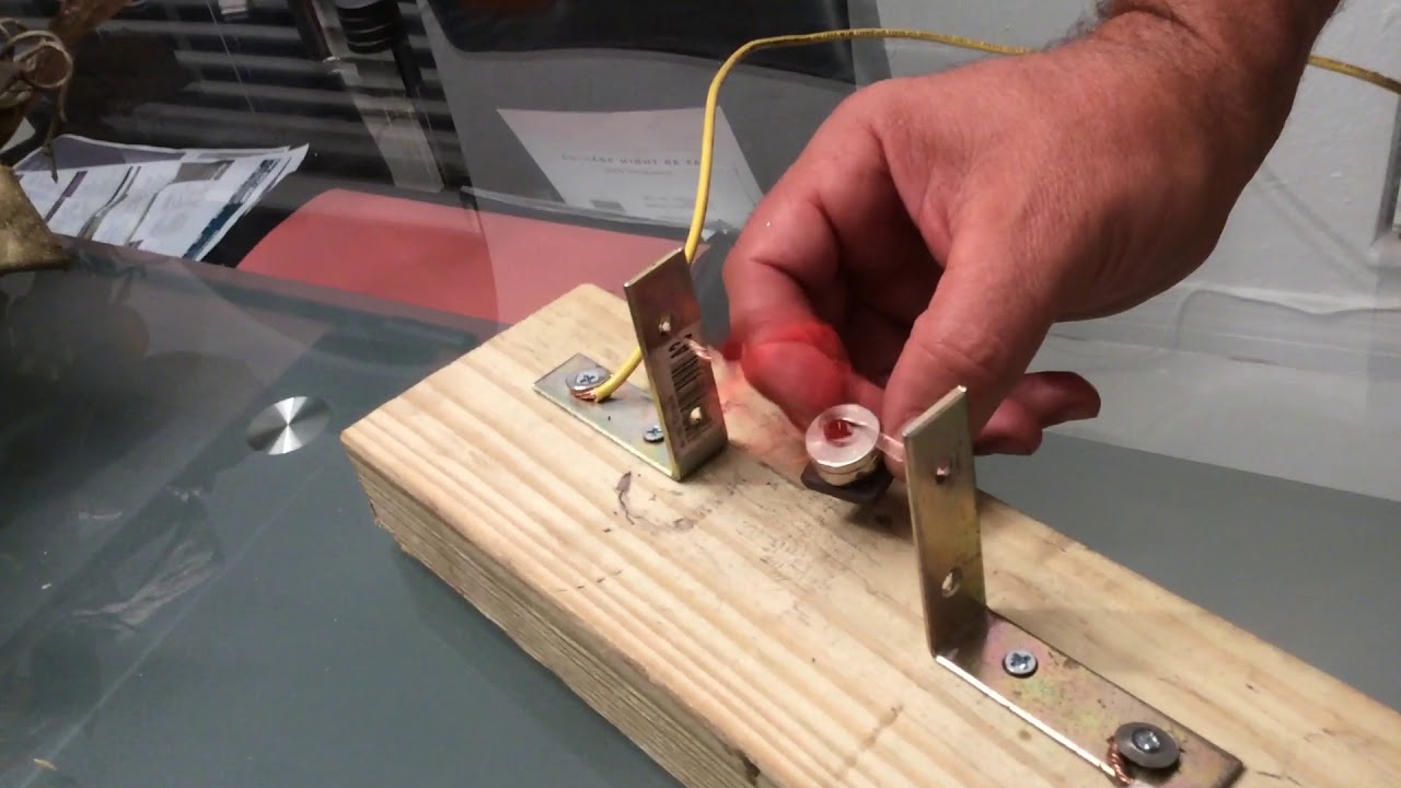 Electric motor experiment with magnet - YouTube