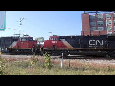 CN 3228,CN 5614 & 3124 Moving A Slow Eastbound Manifest Freight Through Battle Creek Mich 10/11 ...