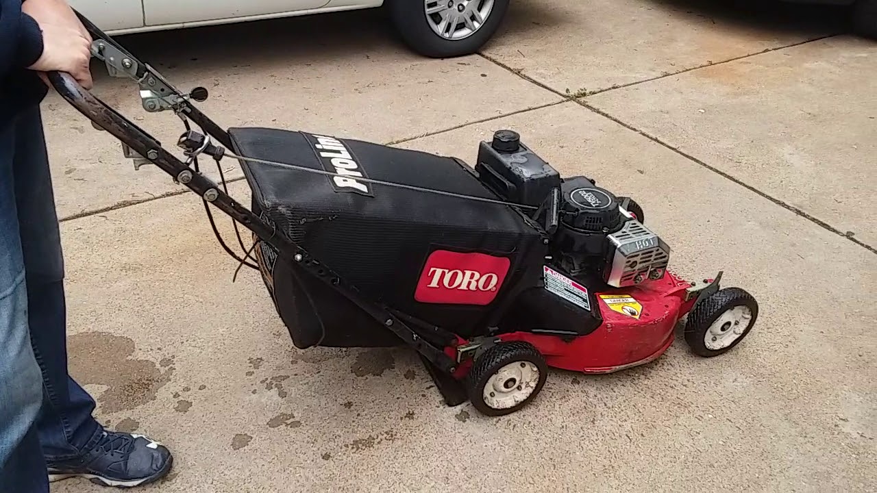 Toro 2 cycle bagger lawnmower - YouTube