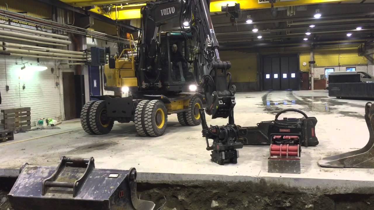 OilQuick quick coupler system - YouTube