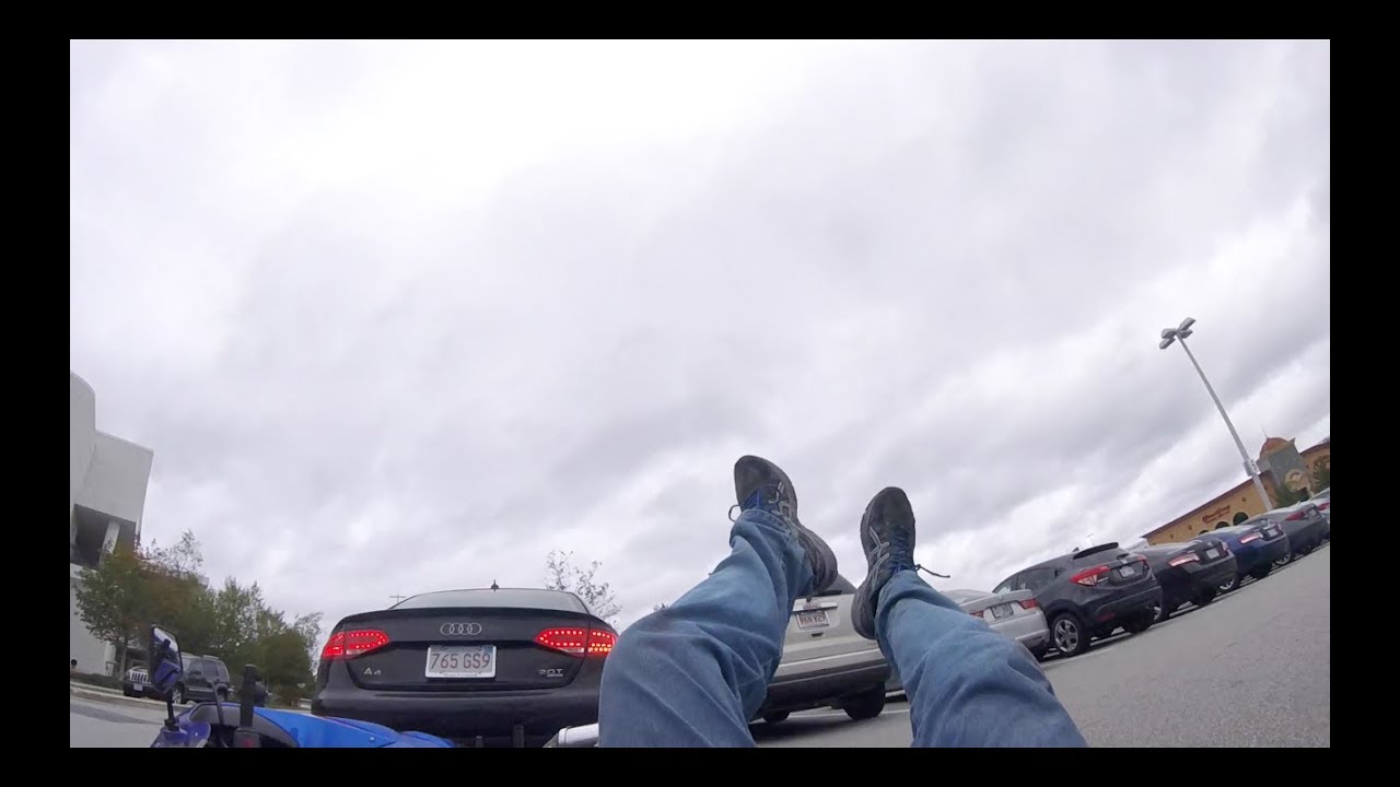 Car backed into Motorcyclist - YouTube