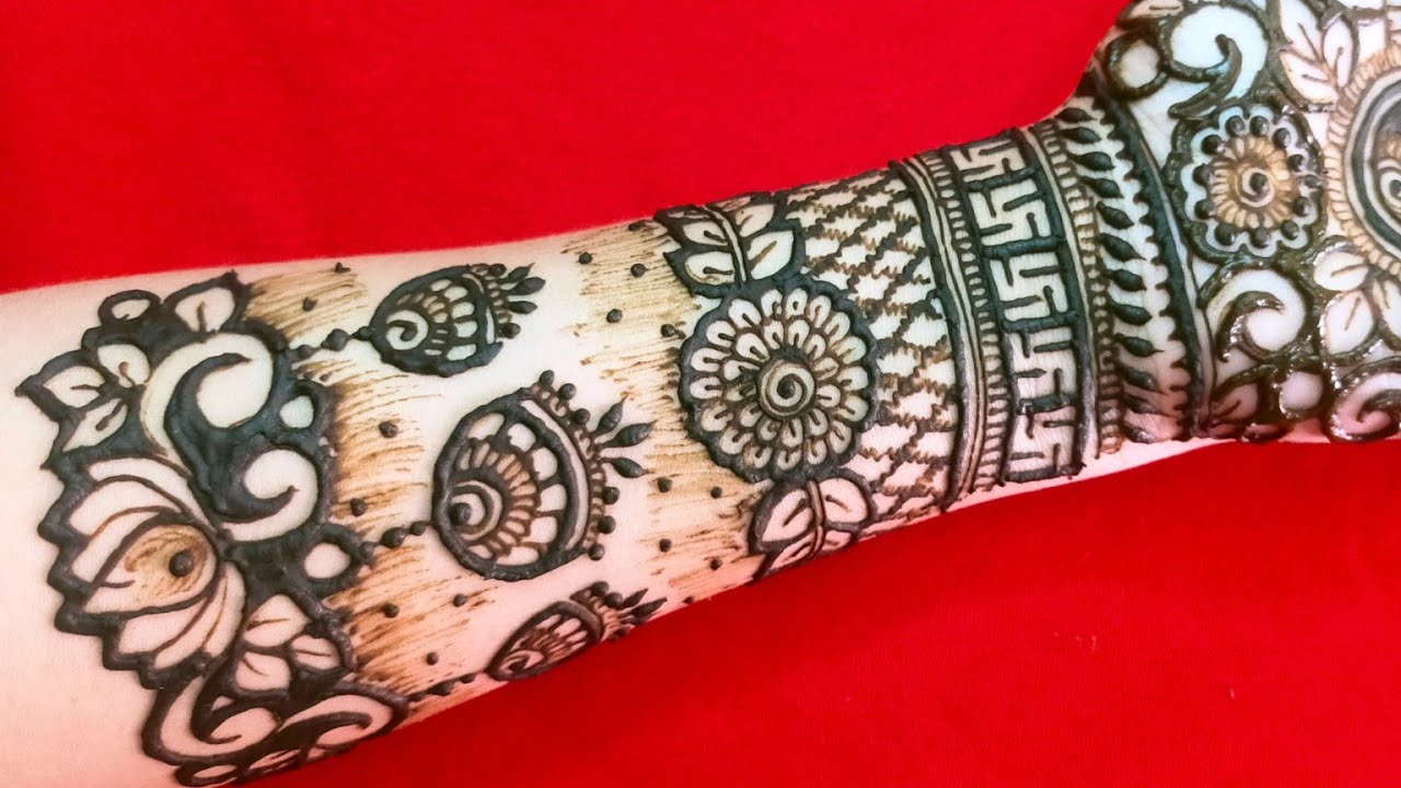 Wedding mehndi designs for hands - Lotus mehndi design - Negative space ...