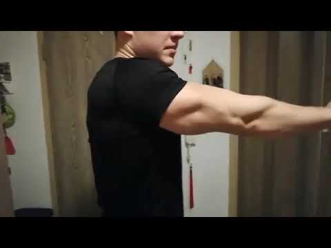 16 years old teen flexing big biceps