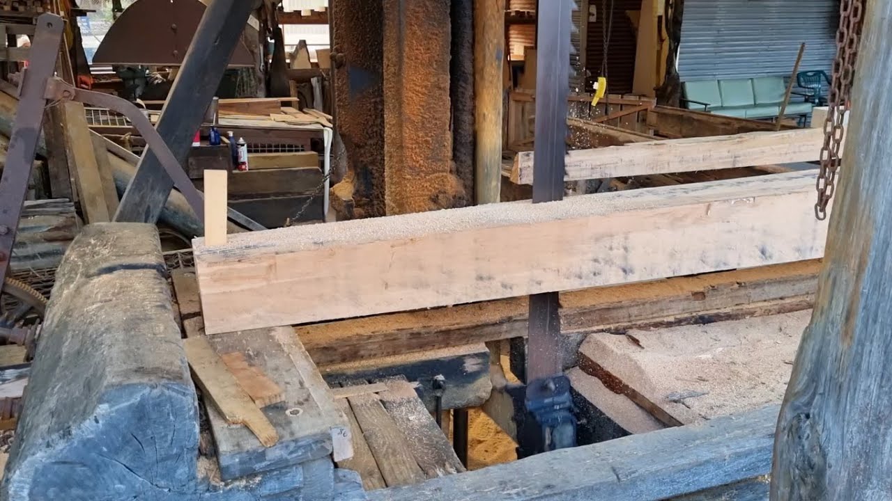 This is a 125 year old Wood Saw cutting through some Timber in a Saw ...