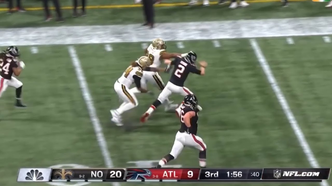 Tuttle 1 handed interception and stiff arms Matt Ryan - YouTube