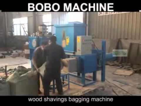 Hydraulic wood shavings compressing and bagging machine - YouTube