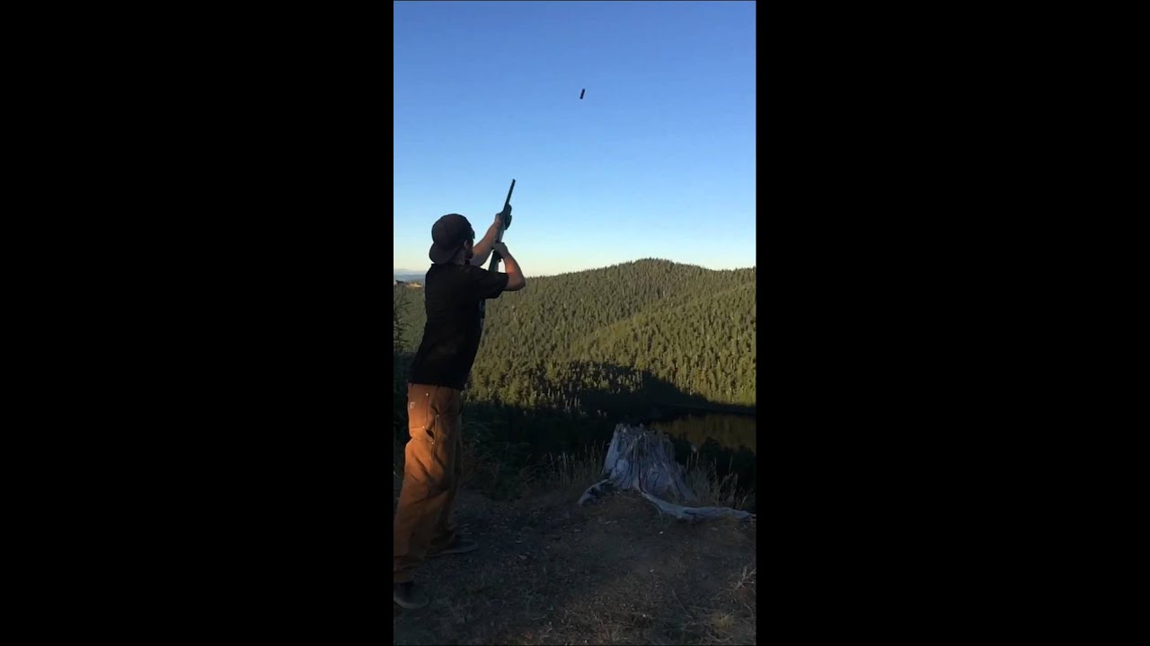 Shooting ejected shotgun shells. - YouTube