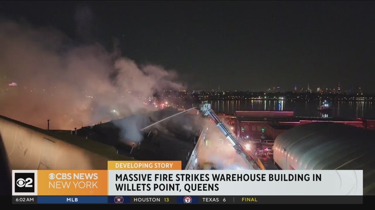 2 firefighters hurt battling Queens warehouse fire - YouTube