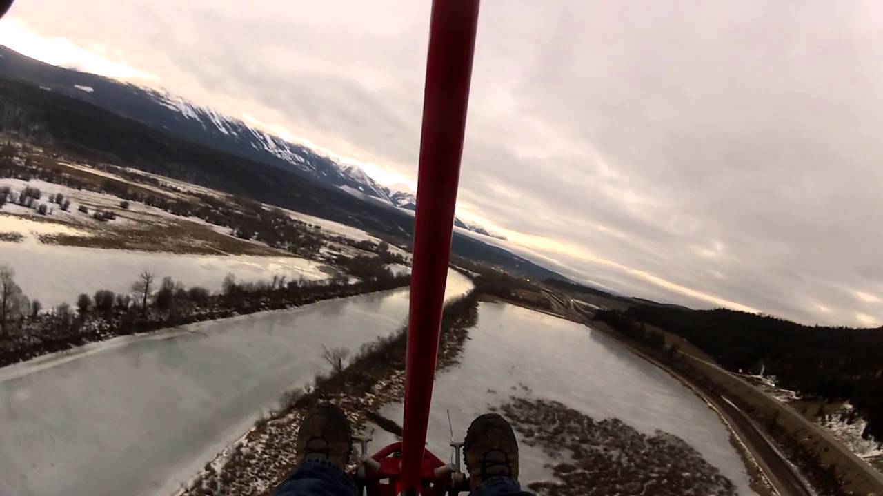 para trike low level over frozen slough and river - YouTube