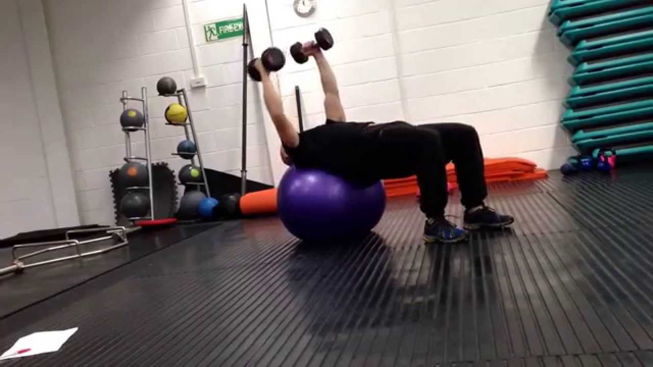 Alternate dumbbell chest flye supine on fitball - YouTube