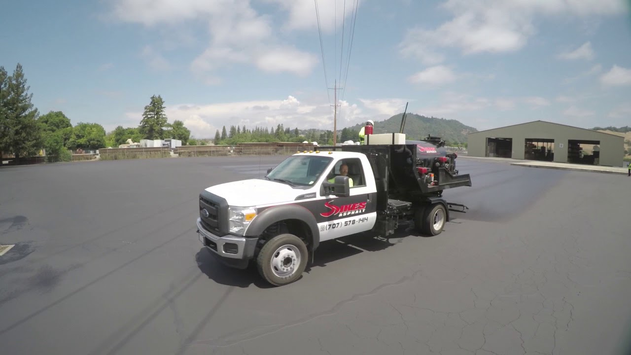 Sikes Asphalt Sealcoats, Paves and Grinds - YouTube
