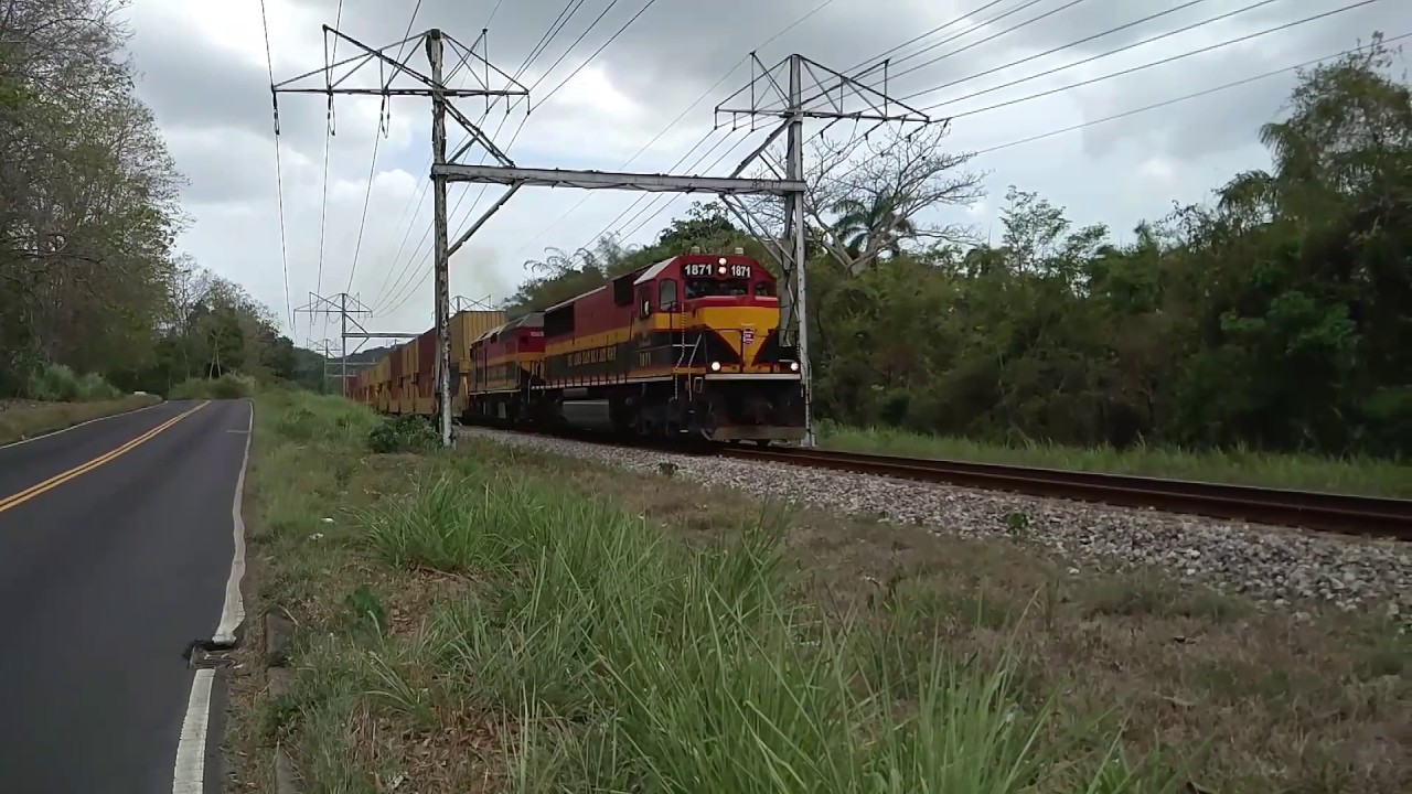 Freight train passing by on the Panama Canal Railway - YouTube