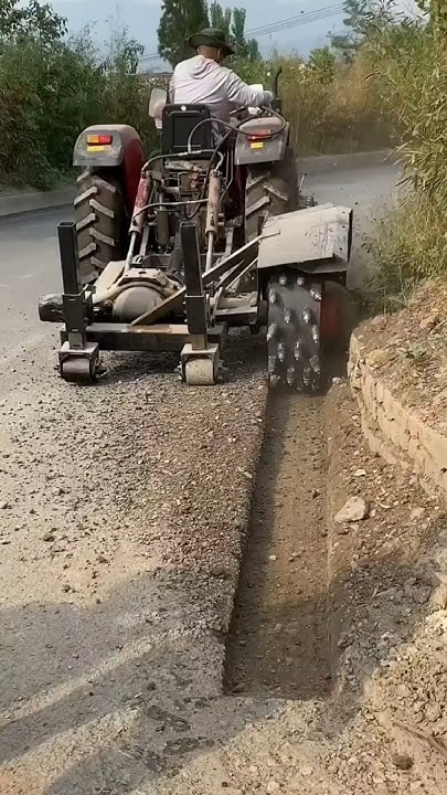 "That's one efficient ditch-digging machine!" - YouTube