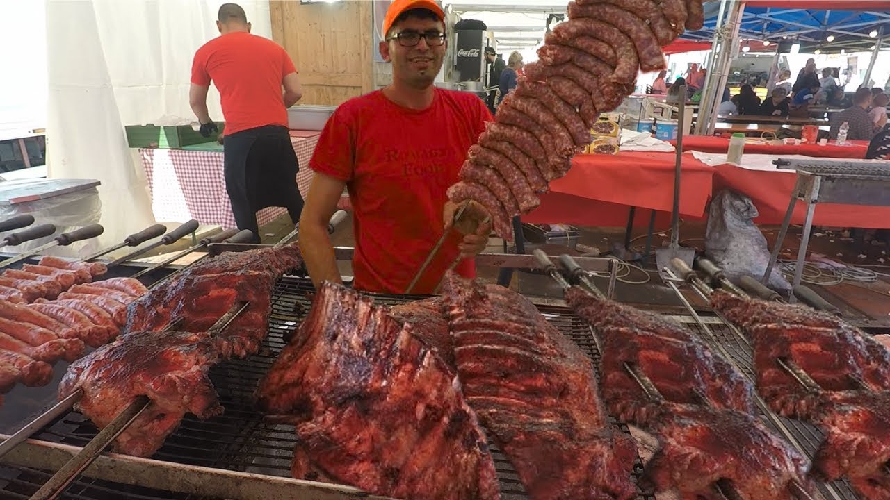 Street Food from Italy. Master of the Grill Prepares and Roasts Huge ...