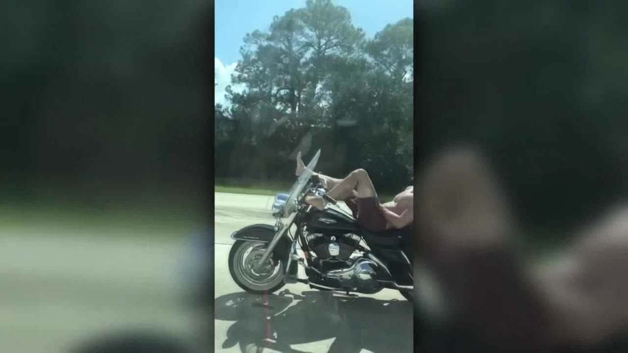 Video: man rides motorcycle only using feet - YouTube