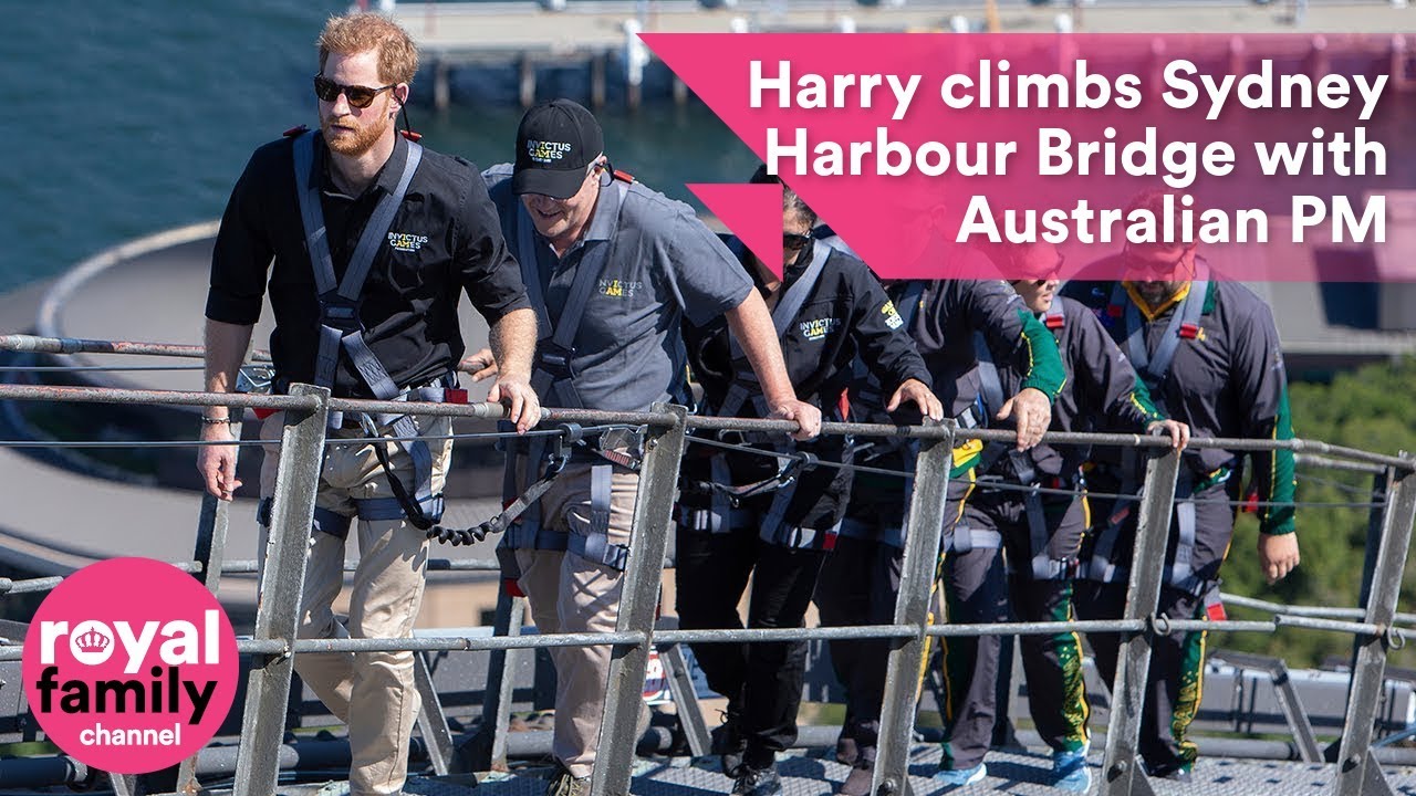 Prince Harry climbs Sydney Harbour Bridge and raises Invictus Flag ...