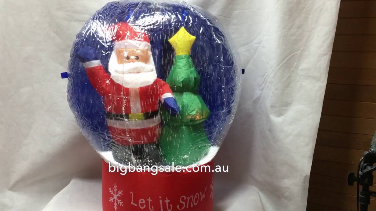 Let it snow inflatable animated santa snow globe - YouTube