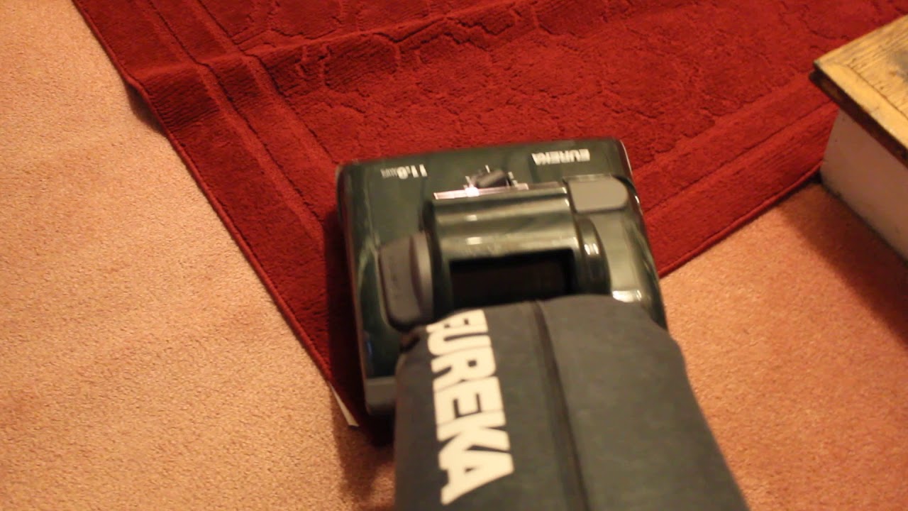 Eureka Bravo lifting and vacuuming the rug - YouTube