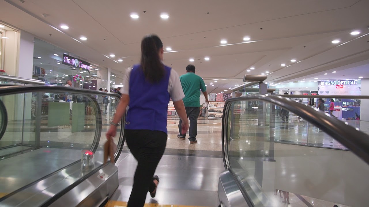 Philippines, Manila, walking inside SM Makati direction Ayala MRT ...