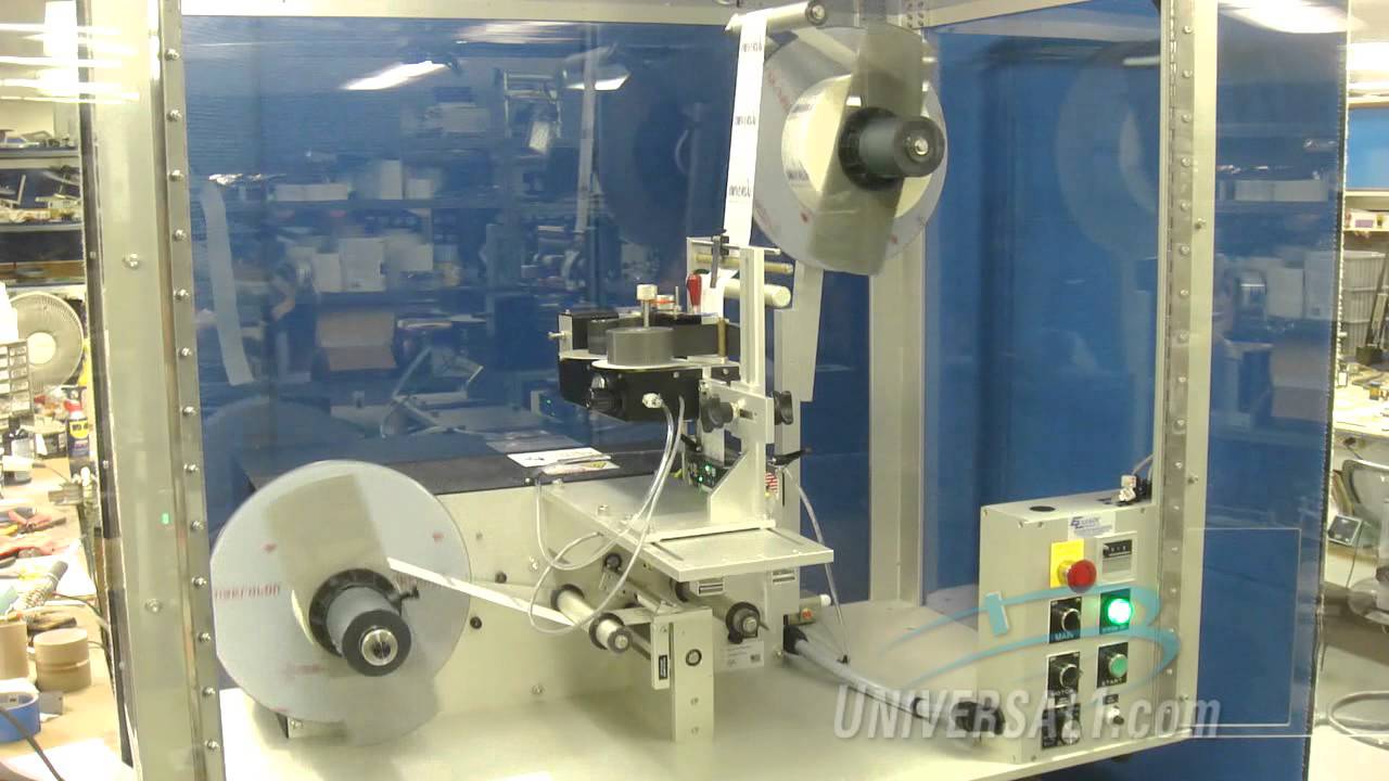 Universal Labeling System Reel to Reel with Enclosure - YouTube