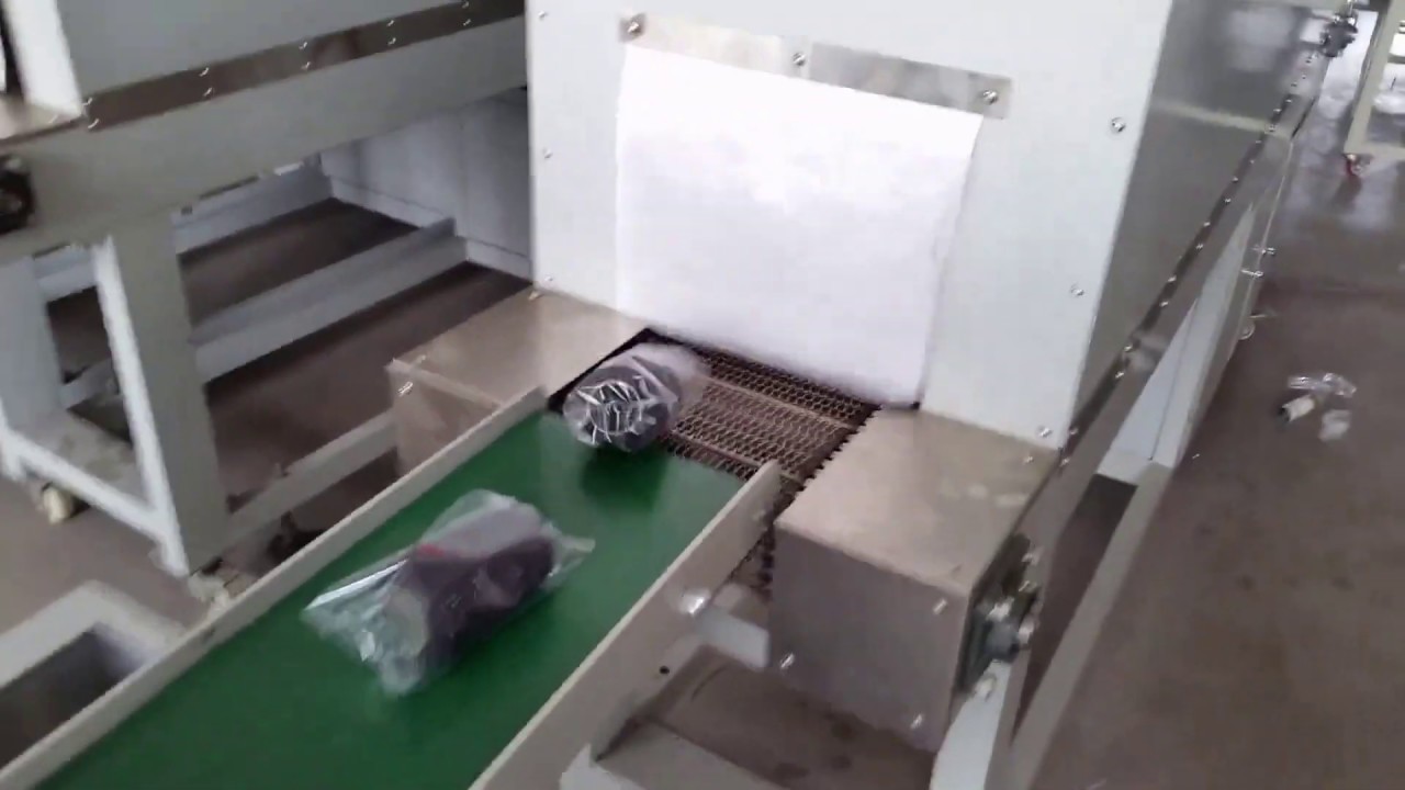 Roller ball Pen shrink wrapping packaging packing machine - YouTube