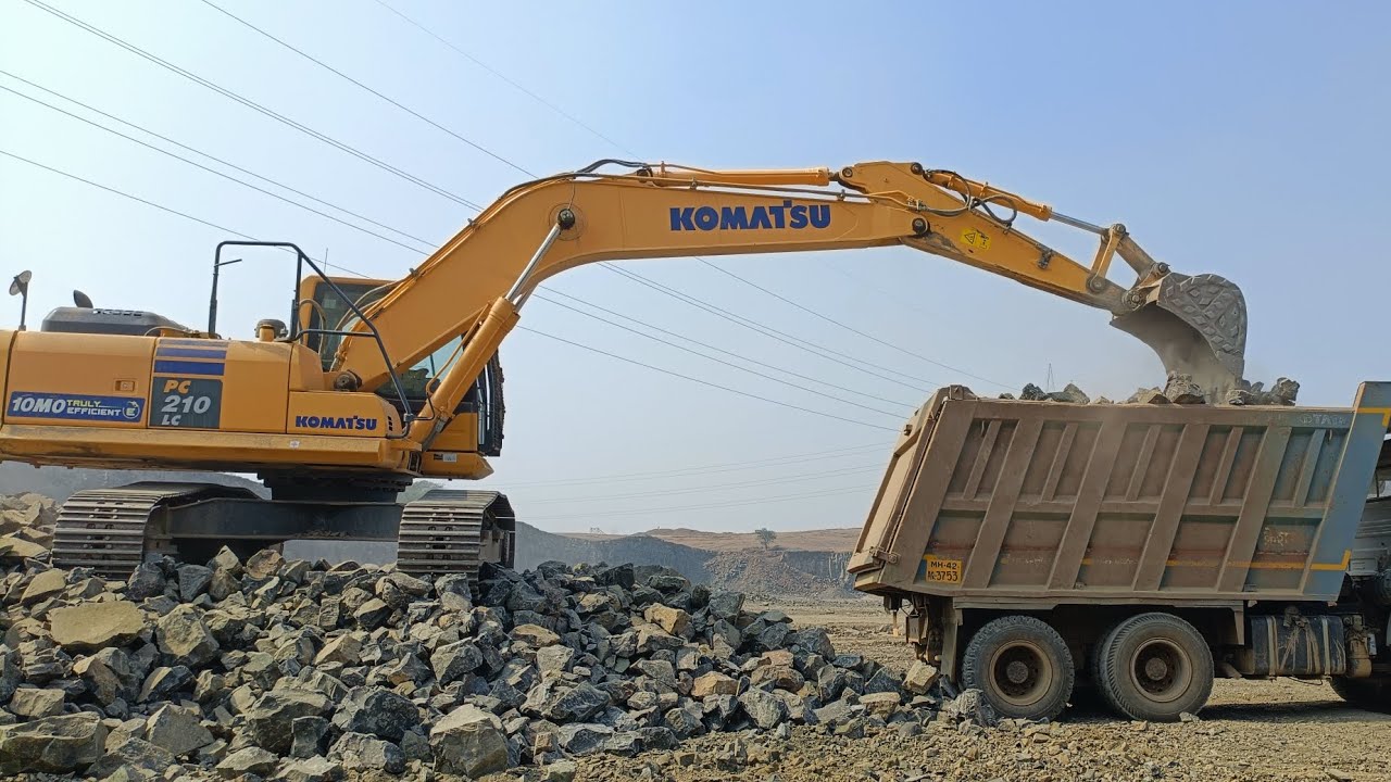 KOMATSU 210 POKLEN MACHINE LOADING SUPER FAST AND, BOULDER LOADING ...