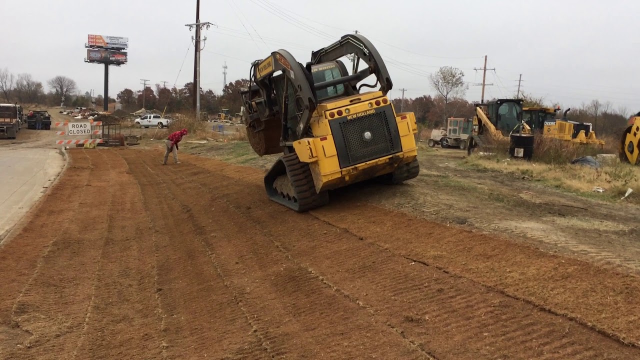 Bobcat sod layer with Sod Guide Pro Attachment - YouTube