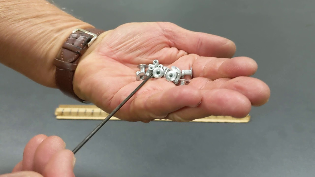Loading loose rivets on a mandrel - YouTube