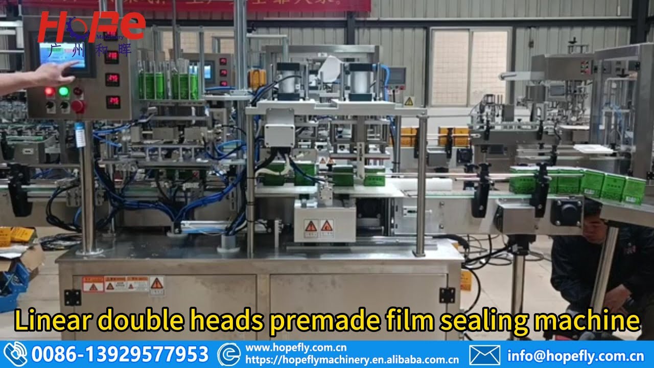 Linear double heads premade film sealing machine - YouTube