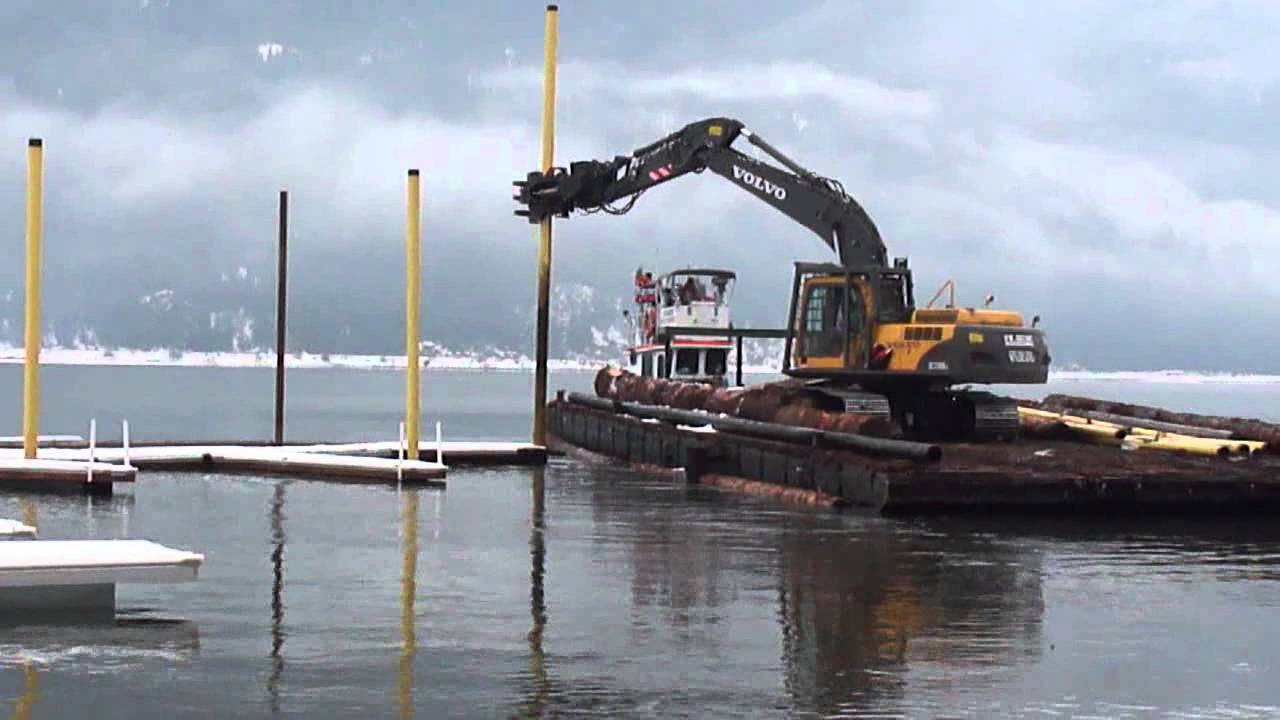 Driving in a Pile - Big Barge Dock Systems - YouTube