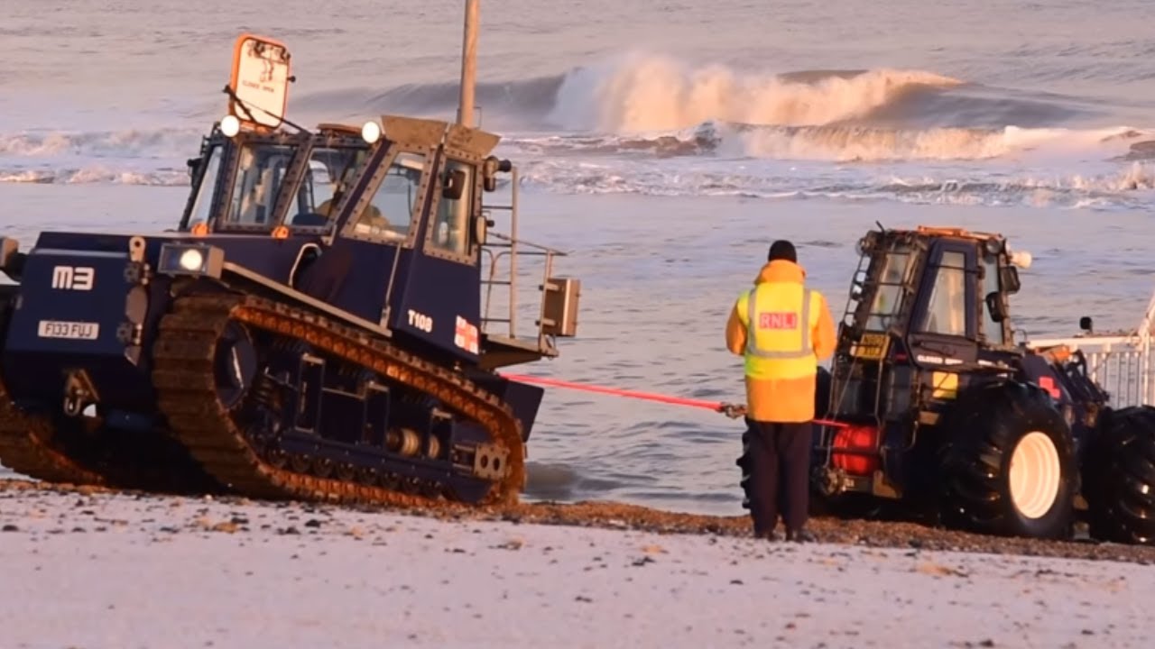 £300,000 tractor and trailer rescued from North Sea by RNLI - YouTube
