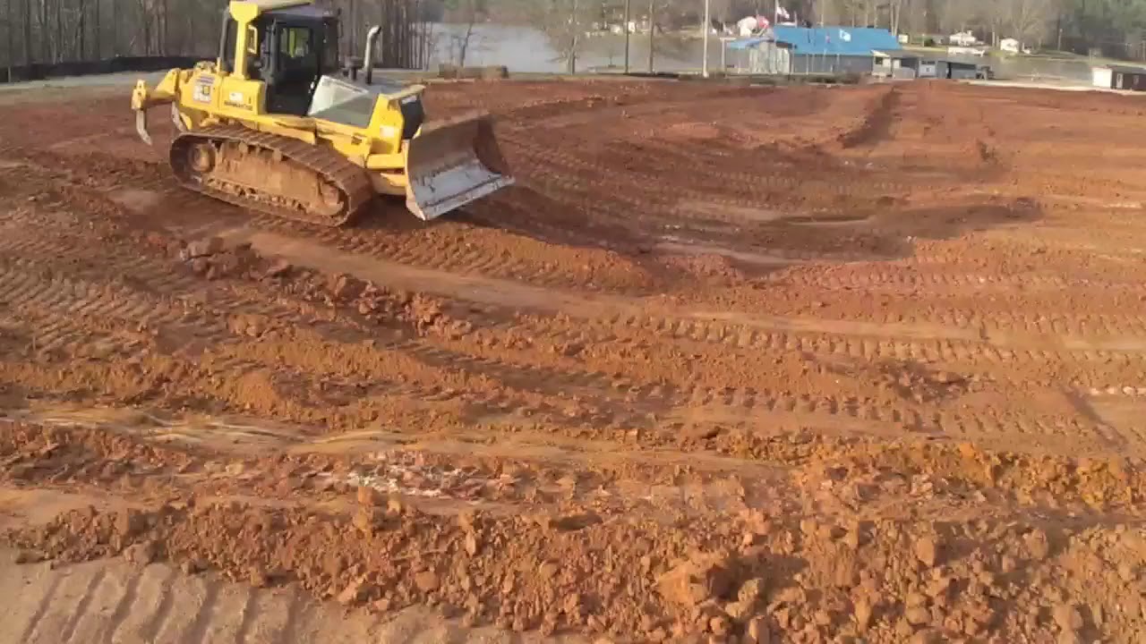 Nick Holland grading a softball field - YouTube