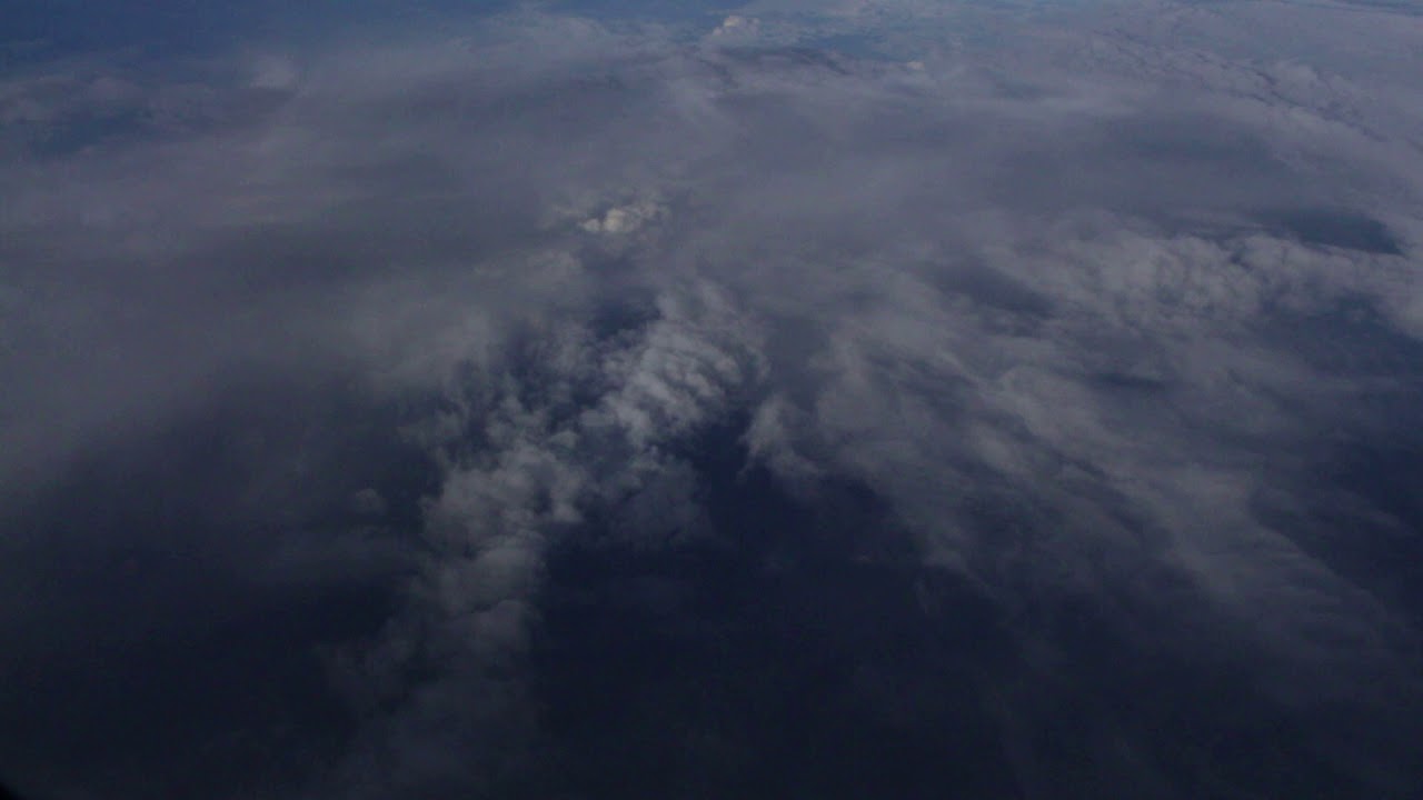 Clouds out an airplane window - YouTube