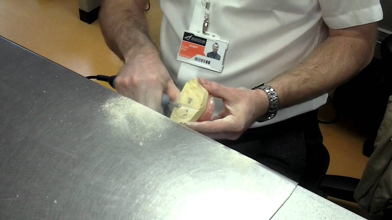 Carving retention grooves in models - YouTube