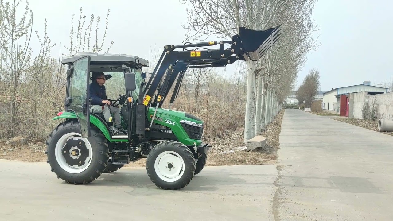 Tavol 504 cab with front end loader operation - YouTube