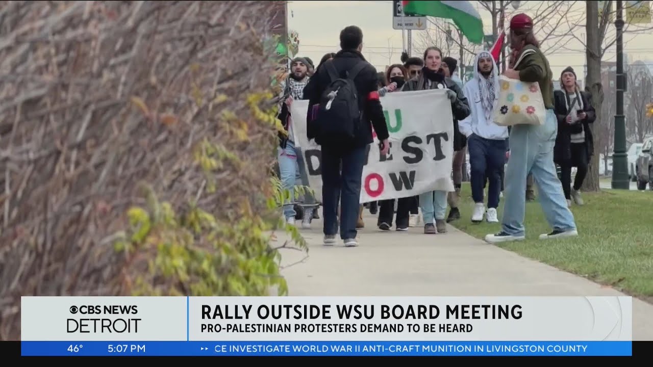 Students protestors march outside of University of Michigan, Wayne ...