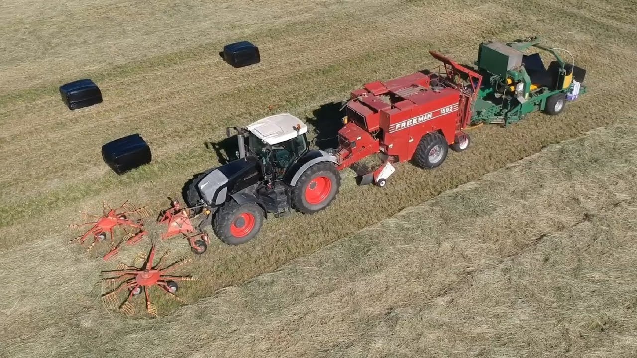 Raking, baling & wrapping grass silage in one pass! - YouTube