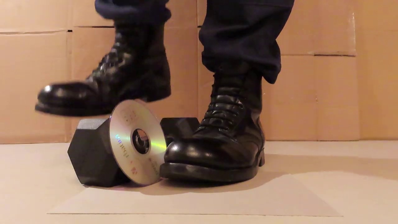 Steel toe combat boots crushing CD - YouTube