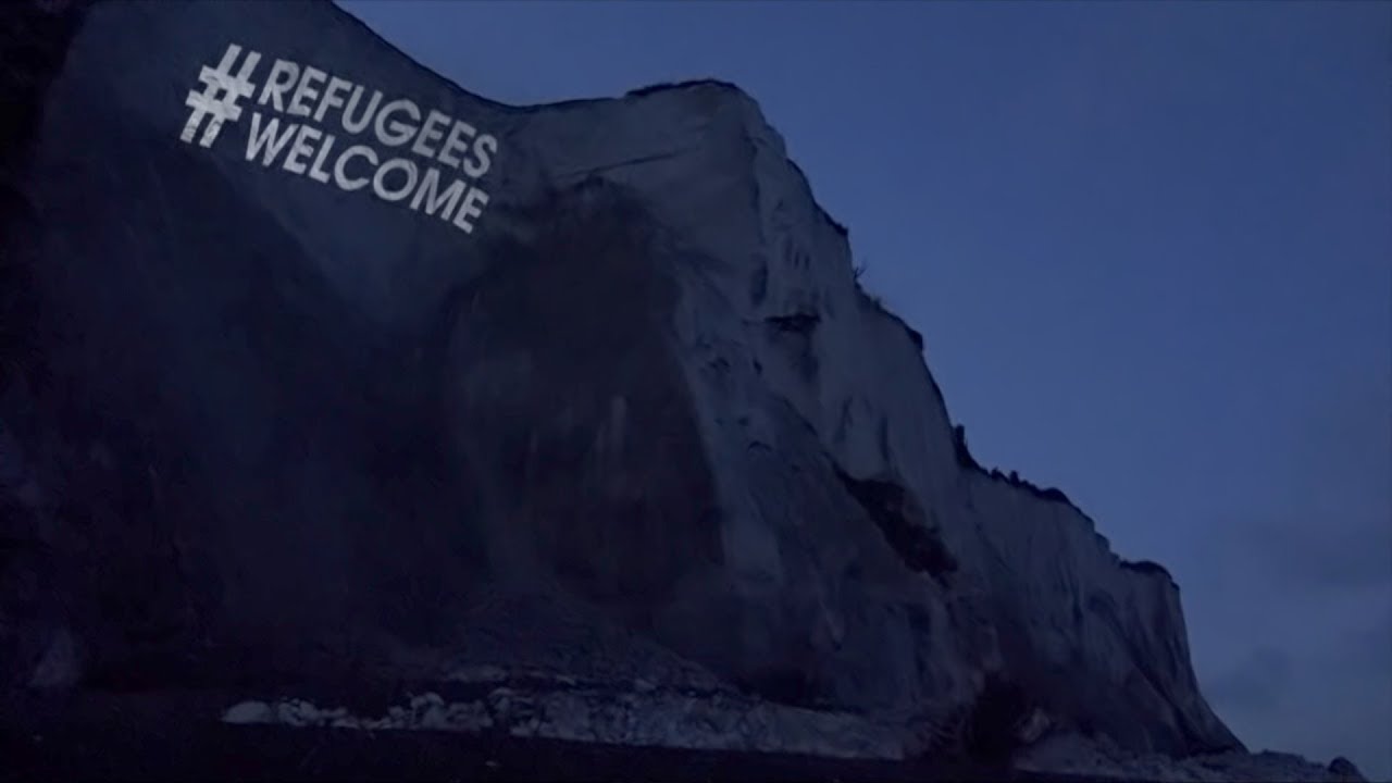Refugees Welcome Projected on White Cliffs of Dover - YouTube