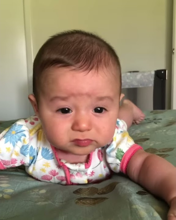 4 month old baby rolling over from back to tummy. Home birth, attachment parenting. Baby ...